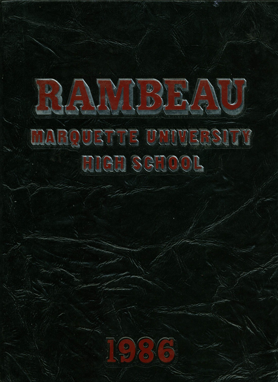 1986 yearbook from Marquette University High School from Milwaukee ...